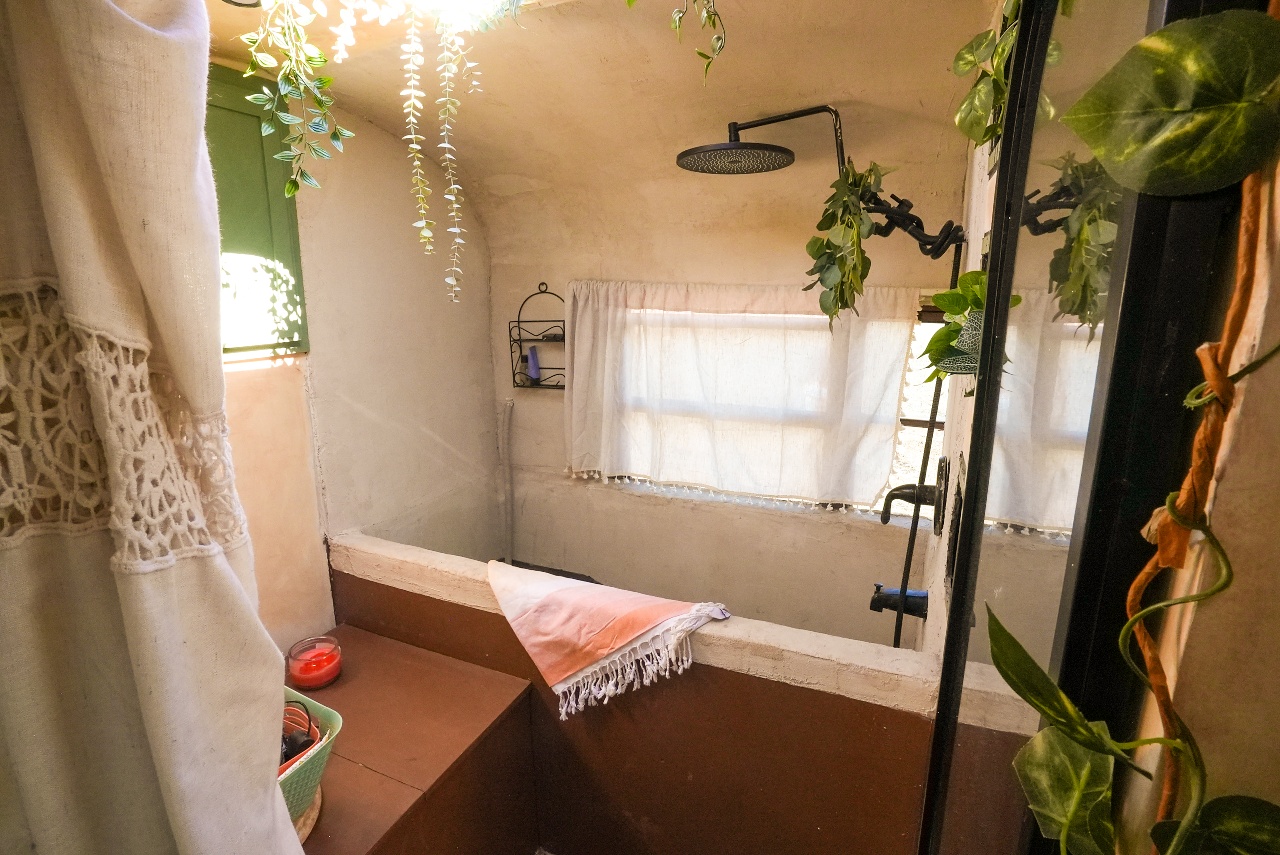 Tiny House Expedition - Couple builds Adobe-style Tiny Home Skoolie
